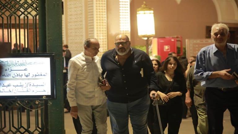 Bayoumi Fouad is overweight and leans on a crutch at the funeral of the ...